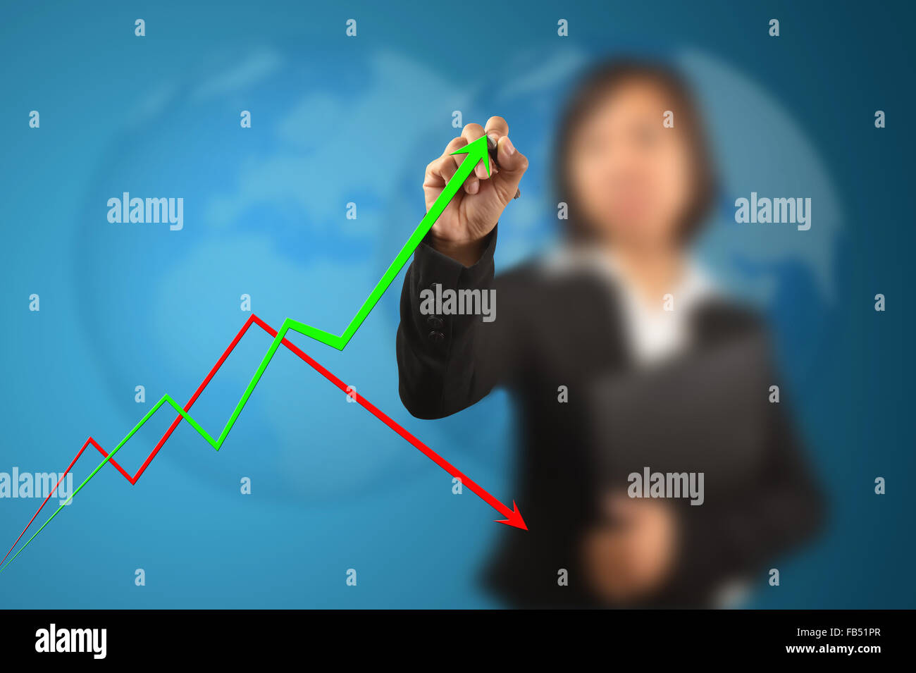 working women write a business graph Stock Photo - Alamy