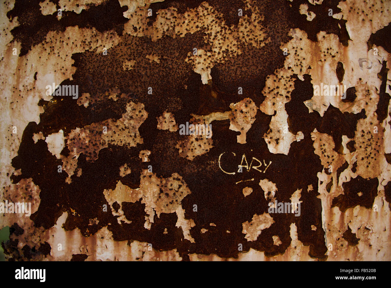 Rusty sign with graffiti signature on right Stock Photo - Alamy