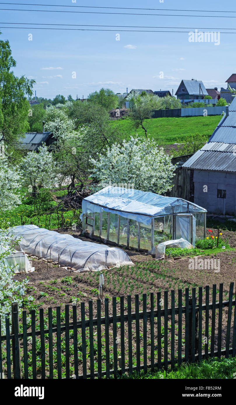 Village landscape.Spring garden Stock Photo - Alamy