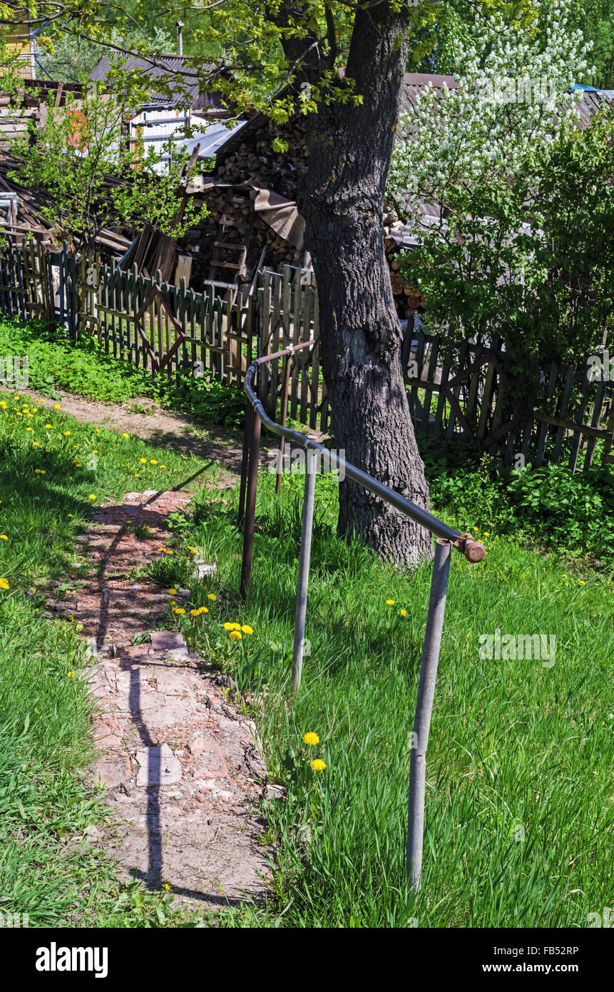 Village landscape. Brick road path Stock Photo - Alamy