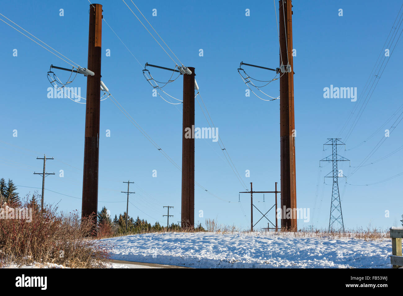 Electrical post carrying cable for electricity Stock Photo - Alamy