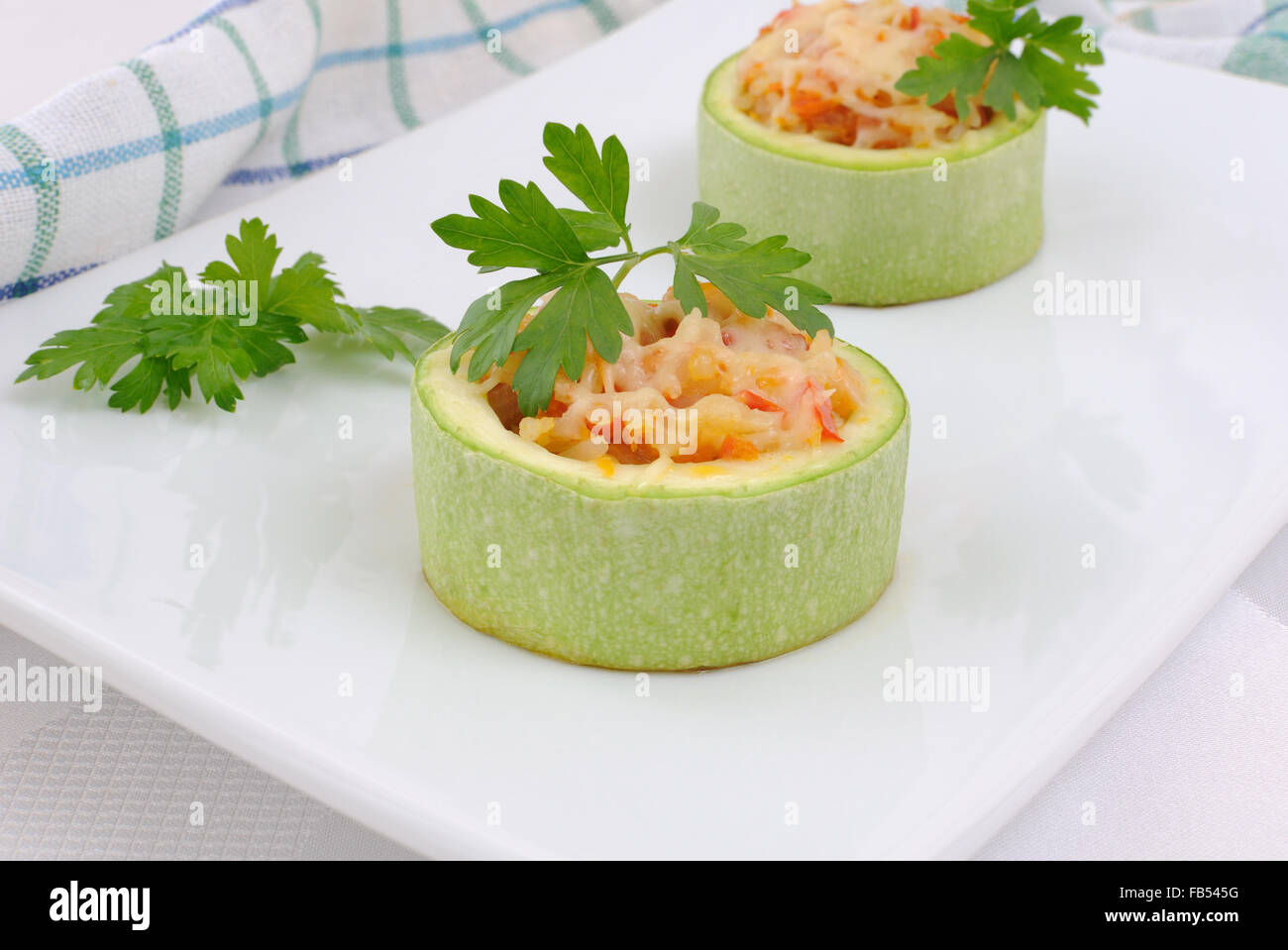 Ring of zucchini stuffed with vegetables with rice and cheese Stock ...