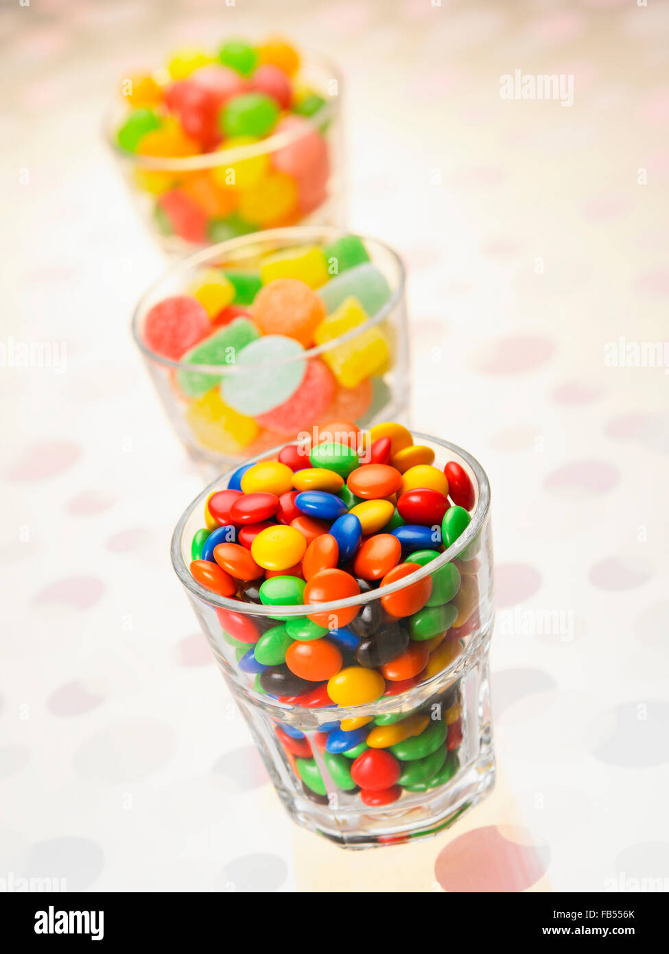 candy arranged in a row Stock Photo - Alamy