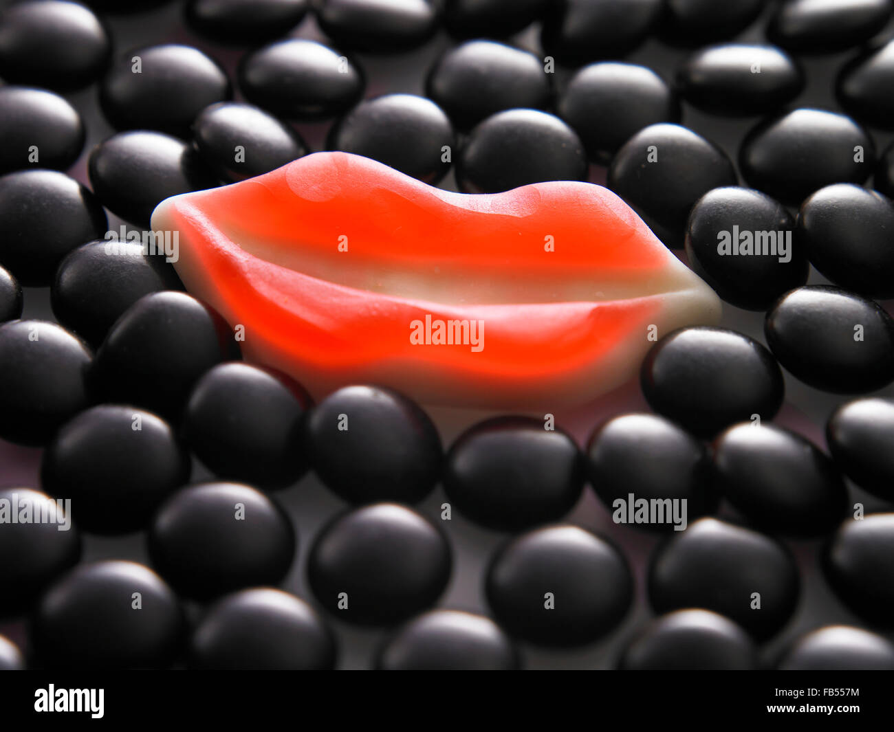 lip shape of gummy candy and chcolate candy together Stock Photo - Alamy