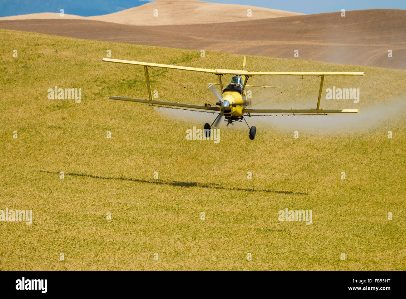Crop duster spraying herbicide on hi-res stock photography and images ...
