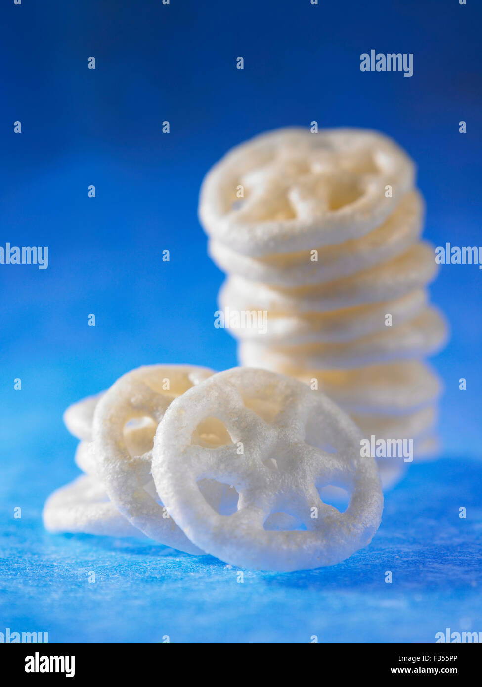 wheel shape of junk food on the color background Stock Photo - Alamy