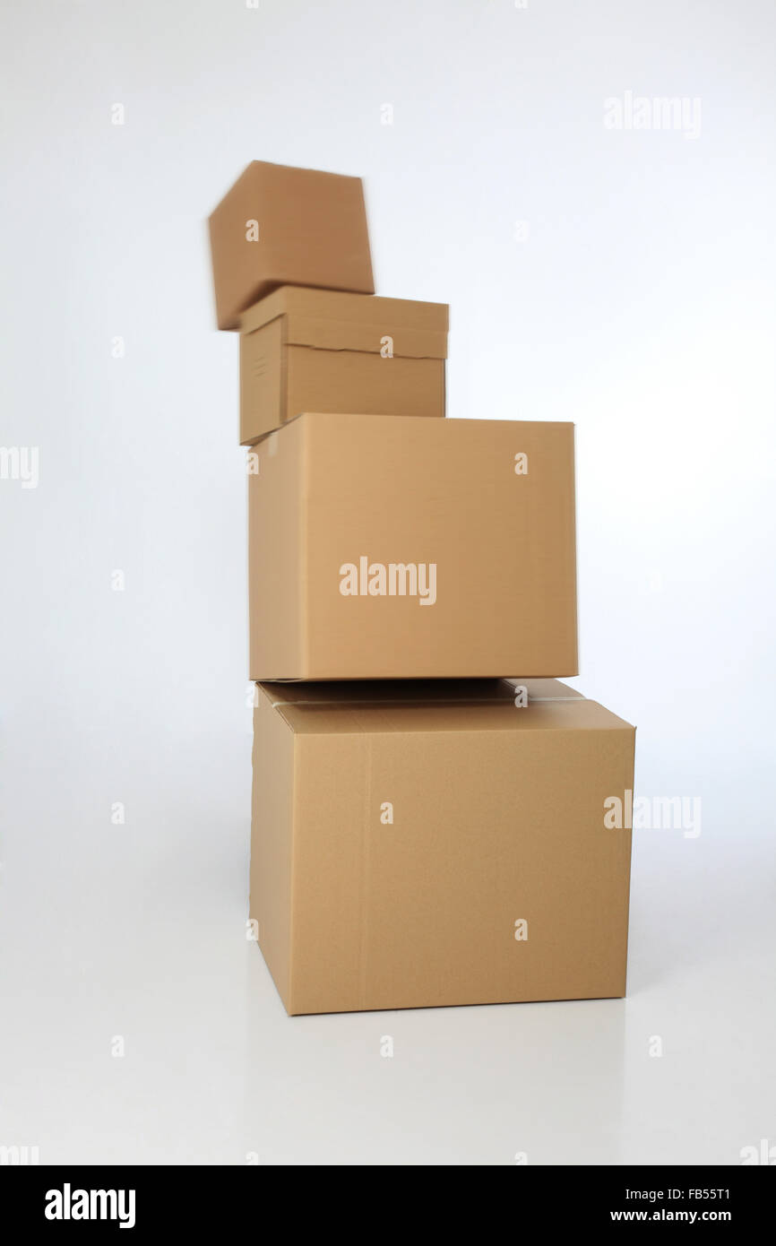 stack of brown color boxes collapse Stock Photo - Alamy
