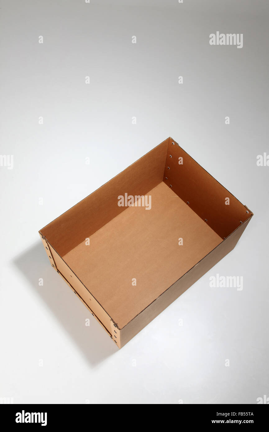 empty brown cardbox open on the plain background Stock Photo - Alamy