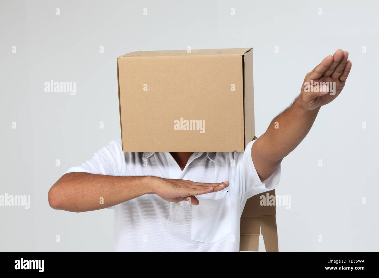 Man with a carton box on head Stock Photo - Alamy