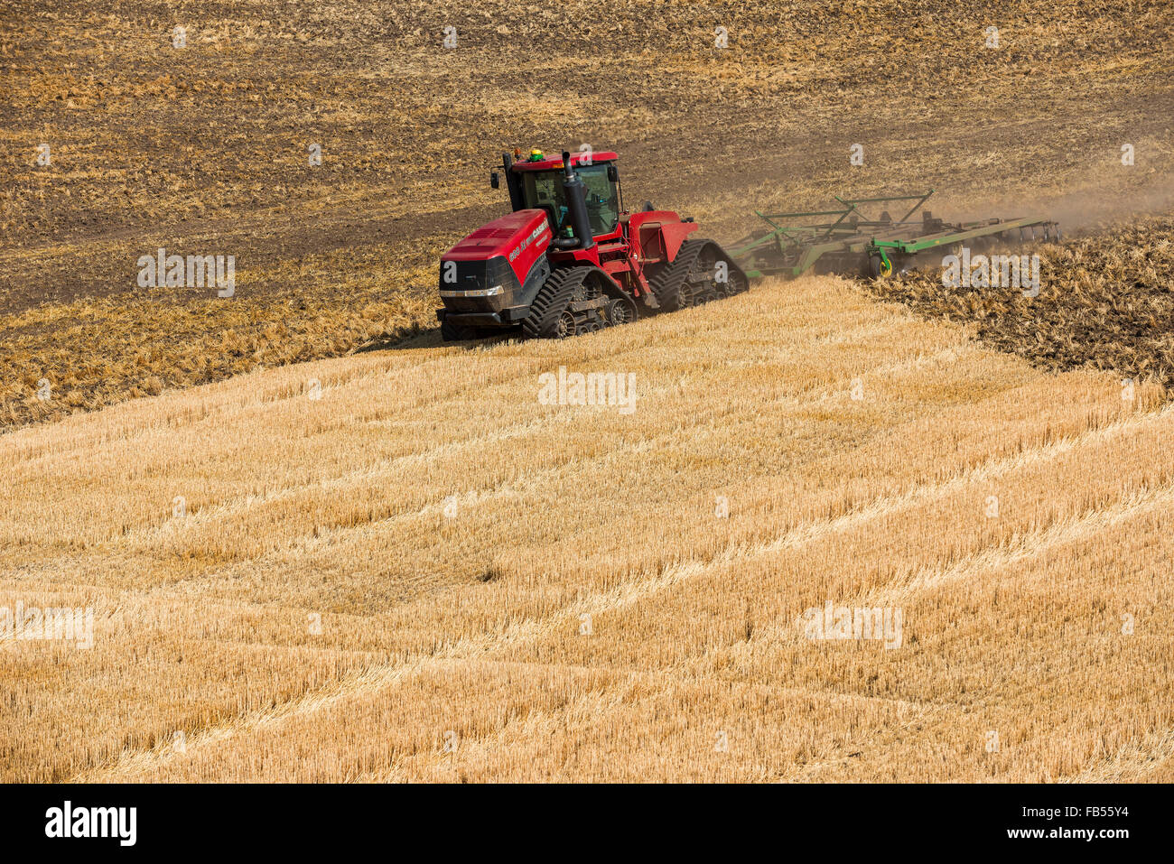 Case quadtrac tractor discing a field of wheat stubble in the Palouse ...