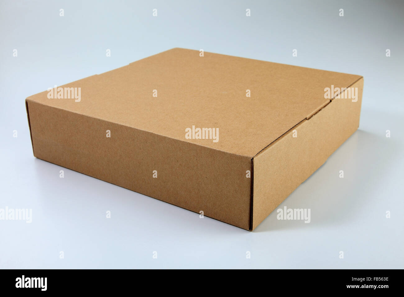 brown color cardbox on the plain color background Stock Photo - Alamy