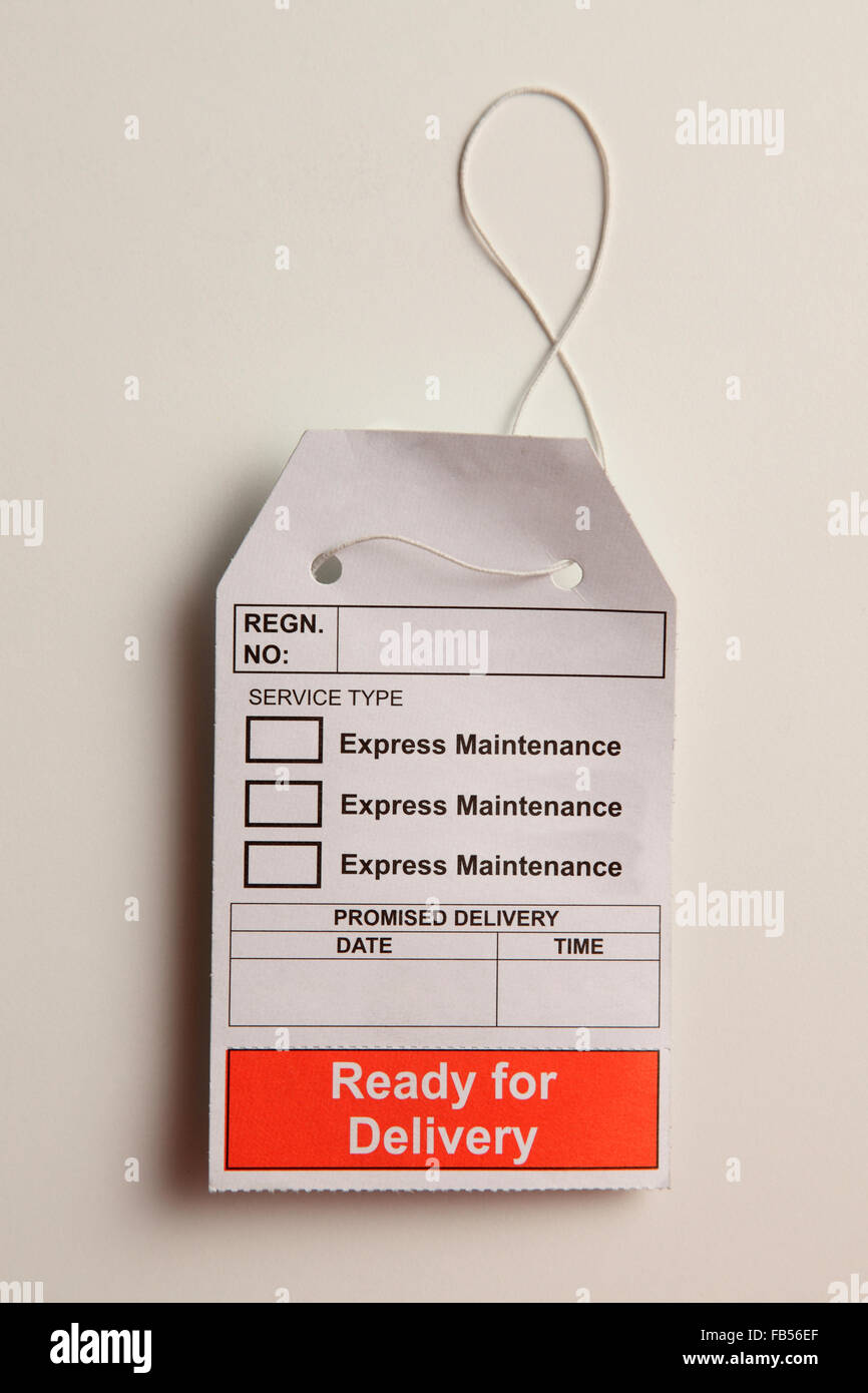 express maintance tag on the plain background Stock Photo - Alamy
