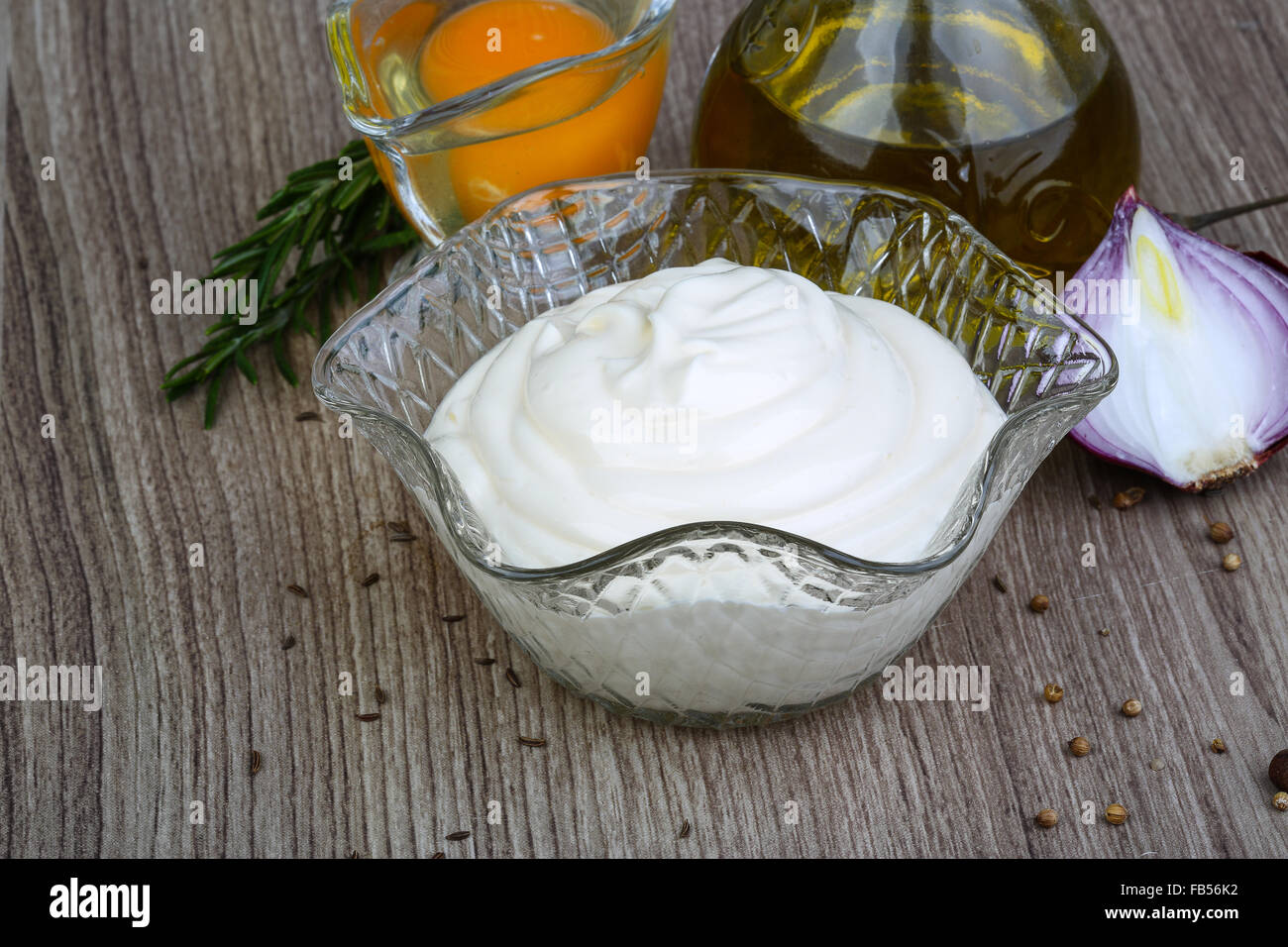 Mayonnaise sauce served raw egg, olive oil and rosemary Stock Photo - Alamy
