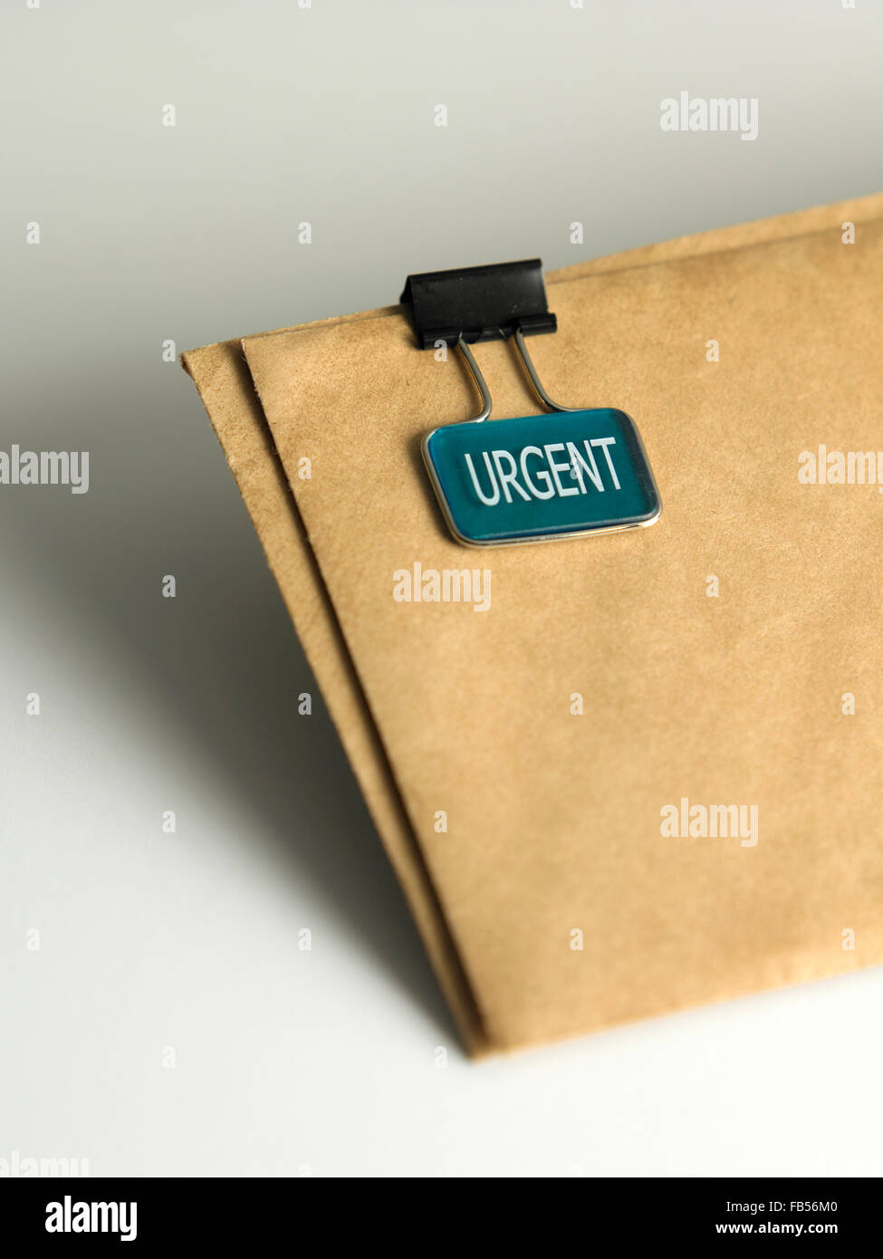 close up of urgent clip onthe document Stock Photo - Alamy