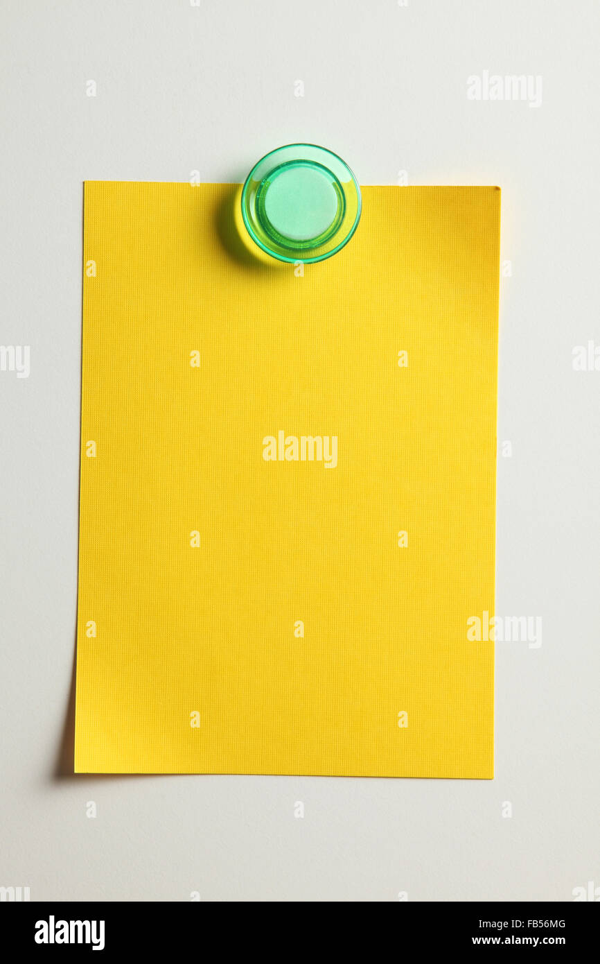 blank yellow note with magnet on the bridge Stock Photo - Alamy