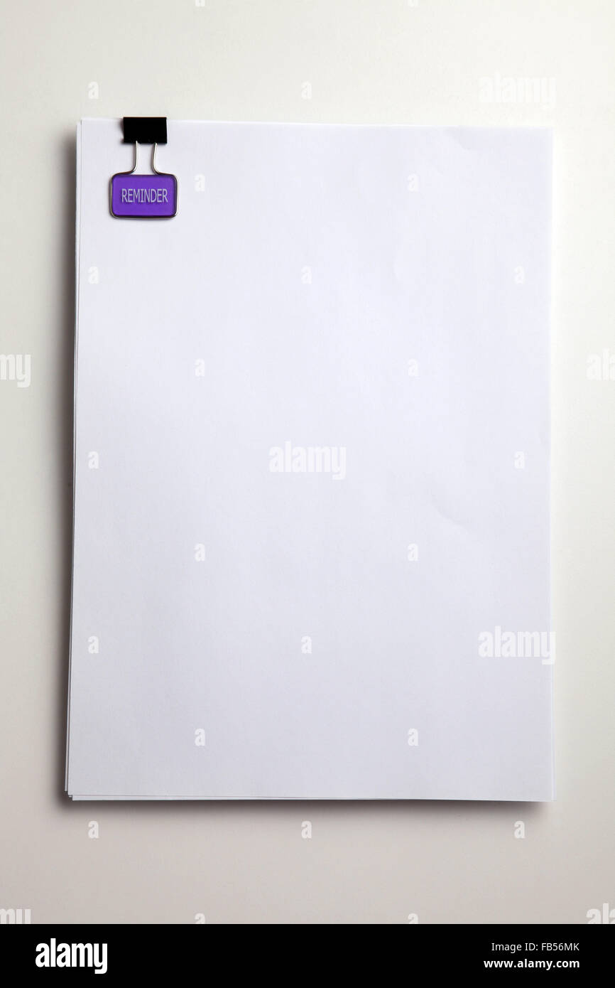 A4 paper clip with reminder sign Stock Photo - Alamy