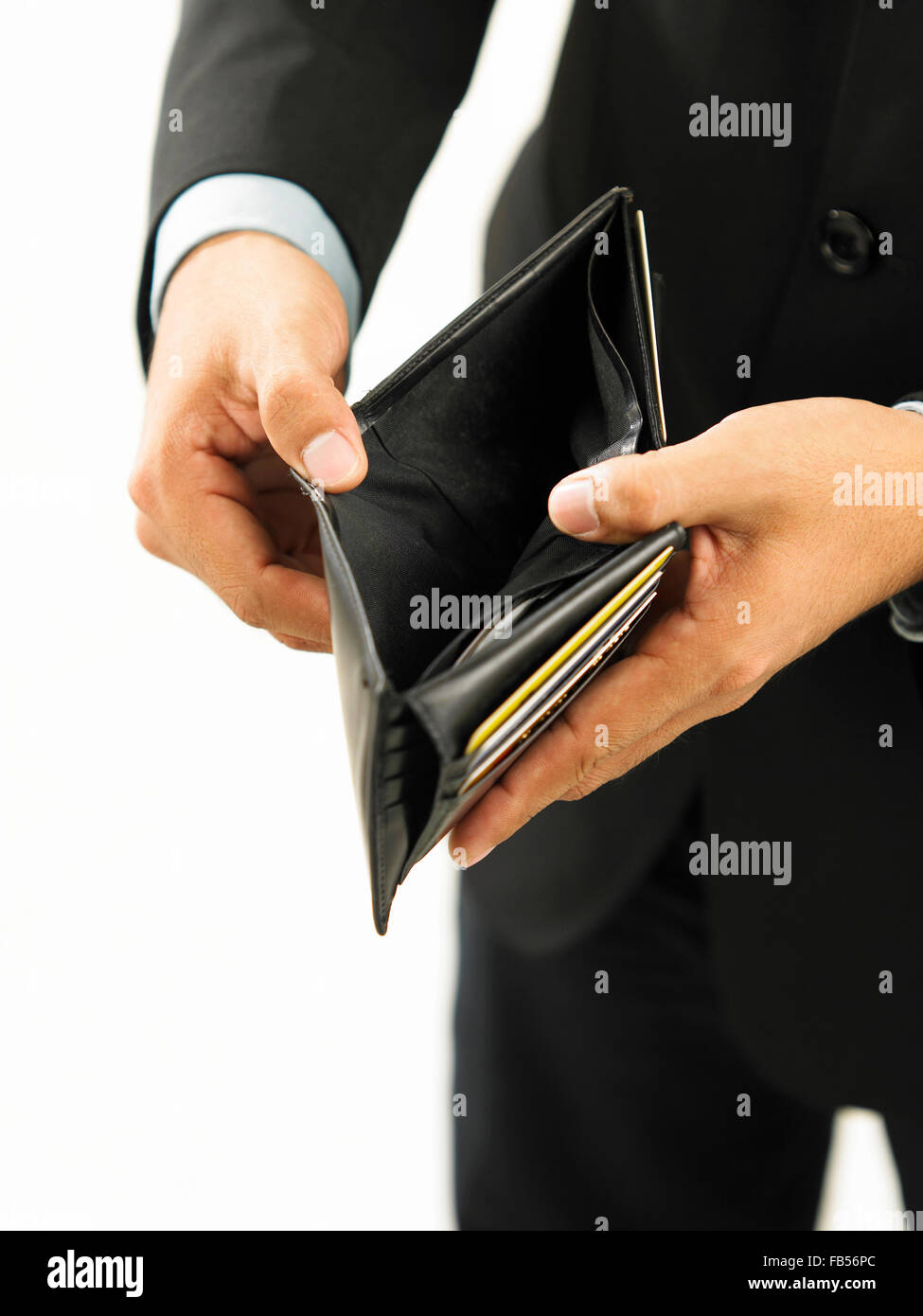 a man with suit showing his empty wallet Stock Photo - Alamy