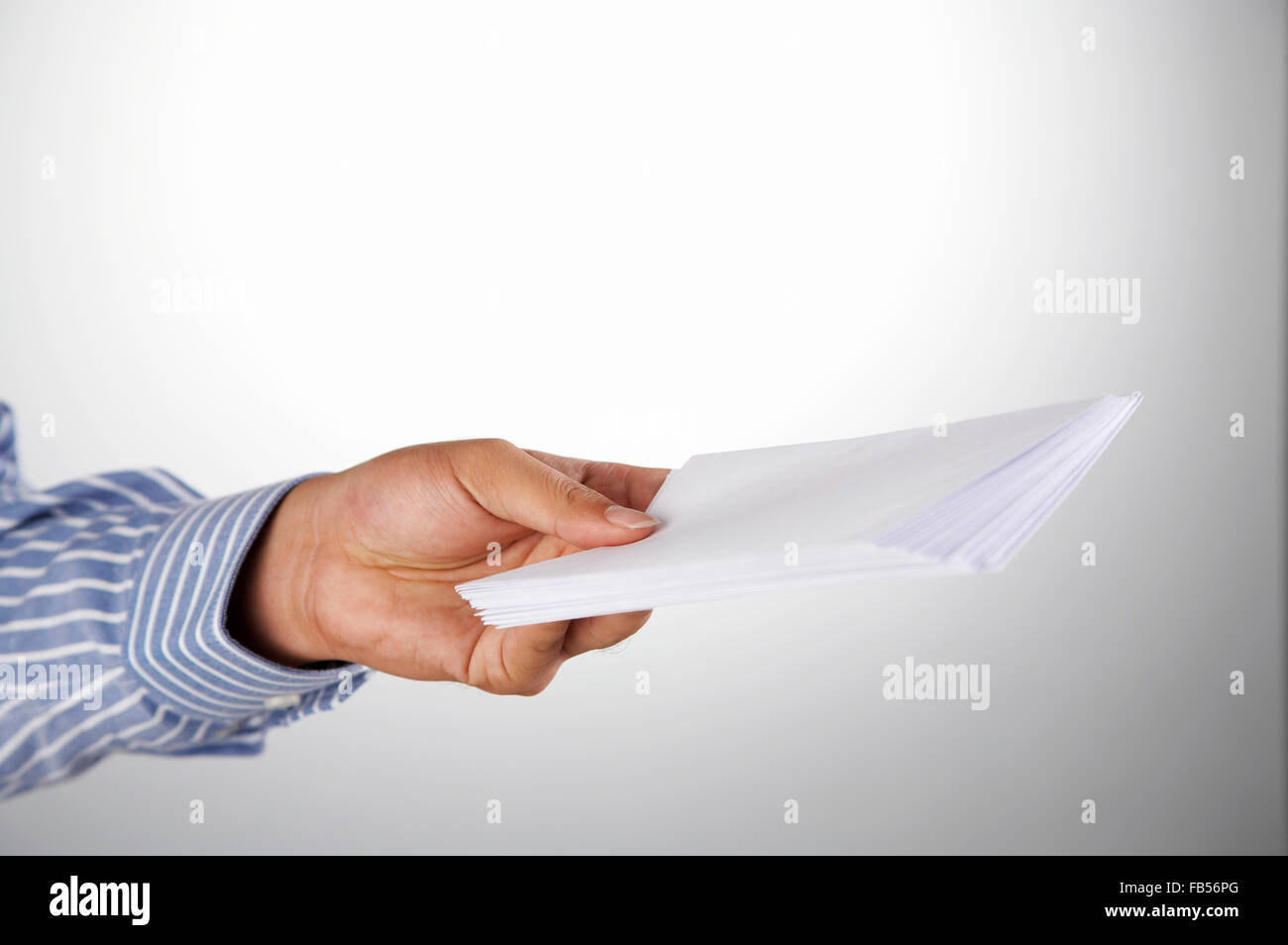 man holding a letter Stock Photo - Alamy