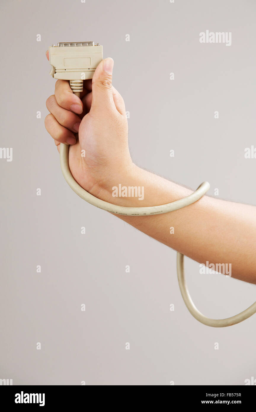 hand holding a cable Stock Photo - Alamy