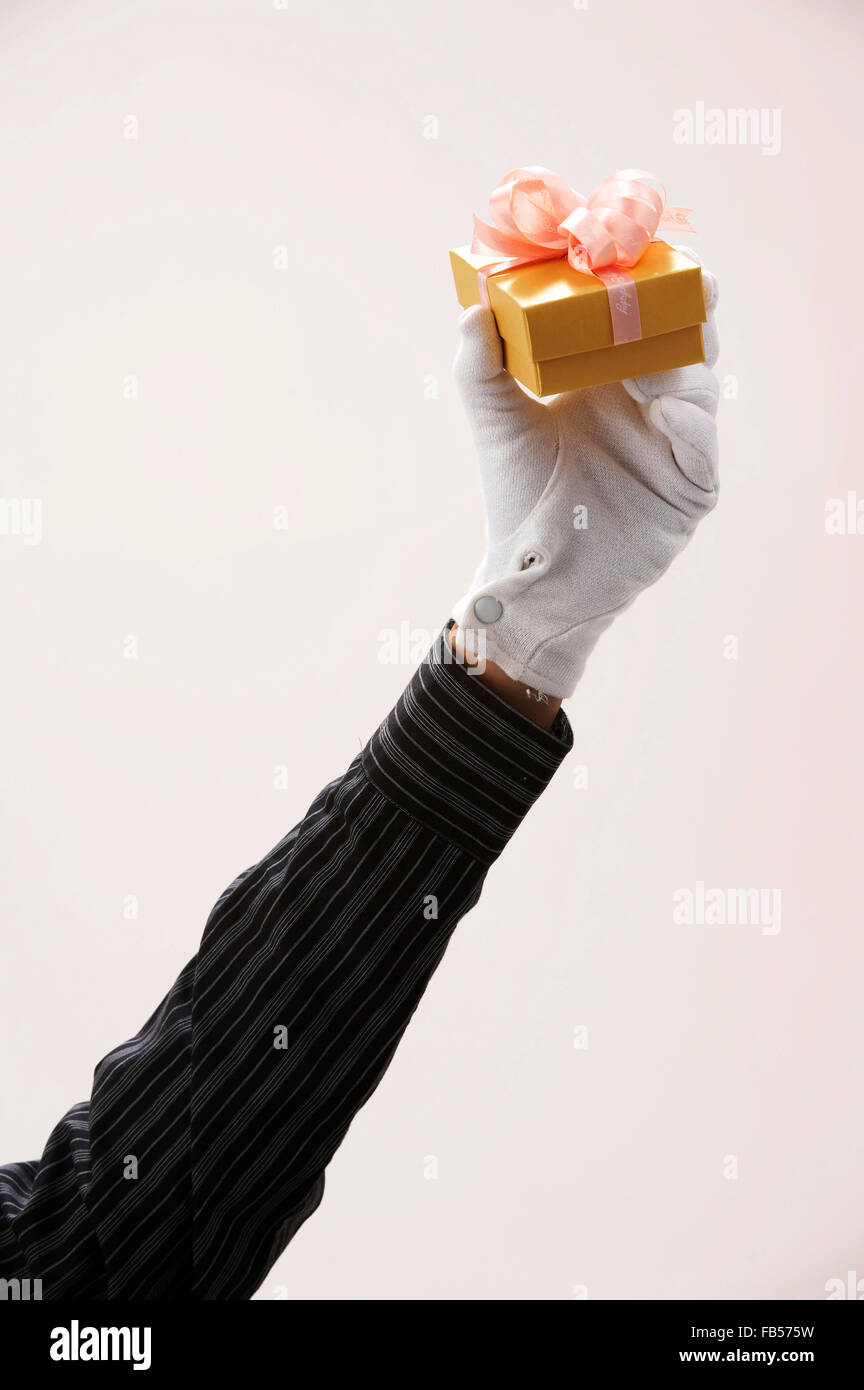 hand lift up a present Stock Photo - Alamy