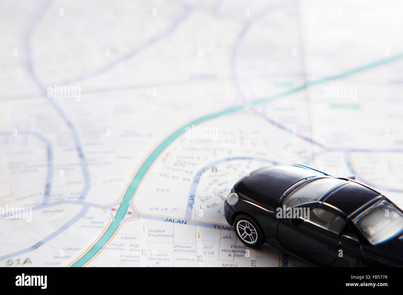concept shot of car on the map Stock Photo - Alamy