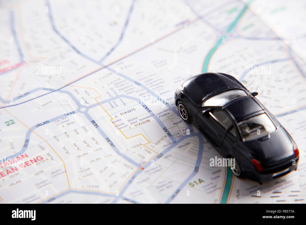 concept shot of car on the map Stock Photo - Alamy