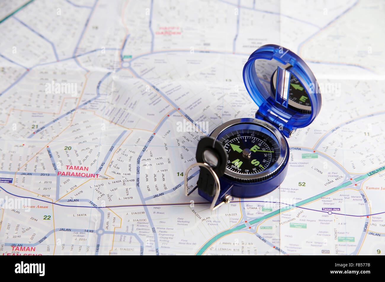 shot of the compass on a map Stock Photo - Alamy