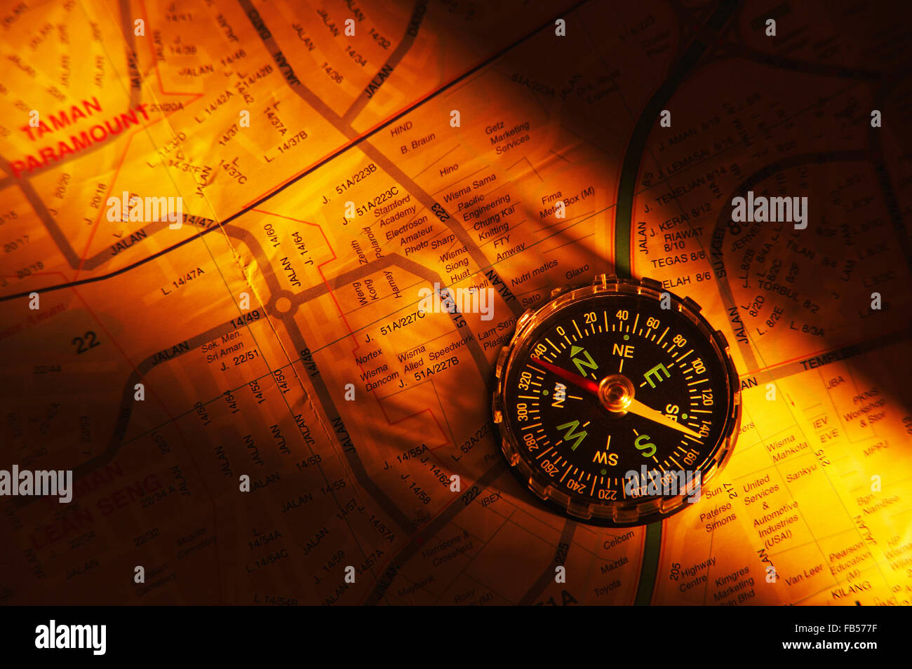 shot of the compass on a map Stock Photo - Alamy