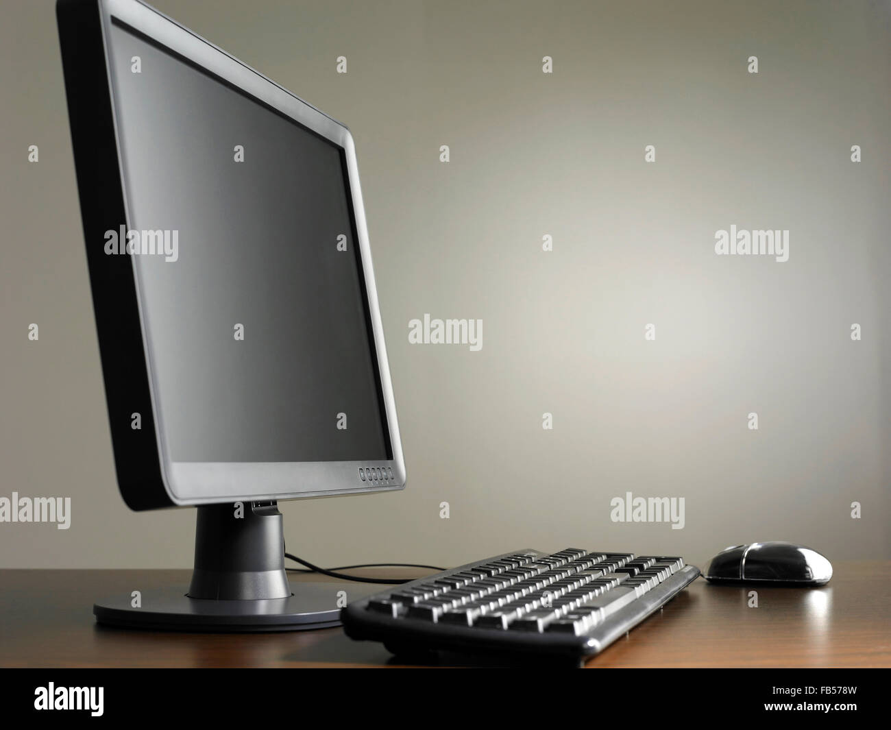 monitor,key board,mouse on the office table Stock Photo - Alamy