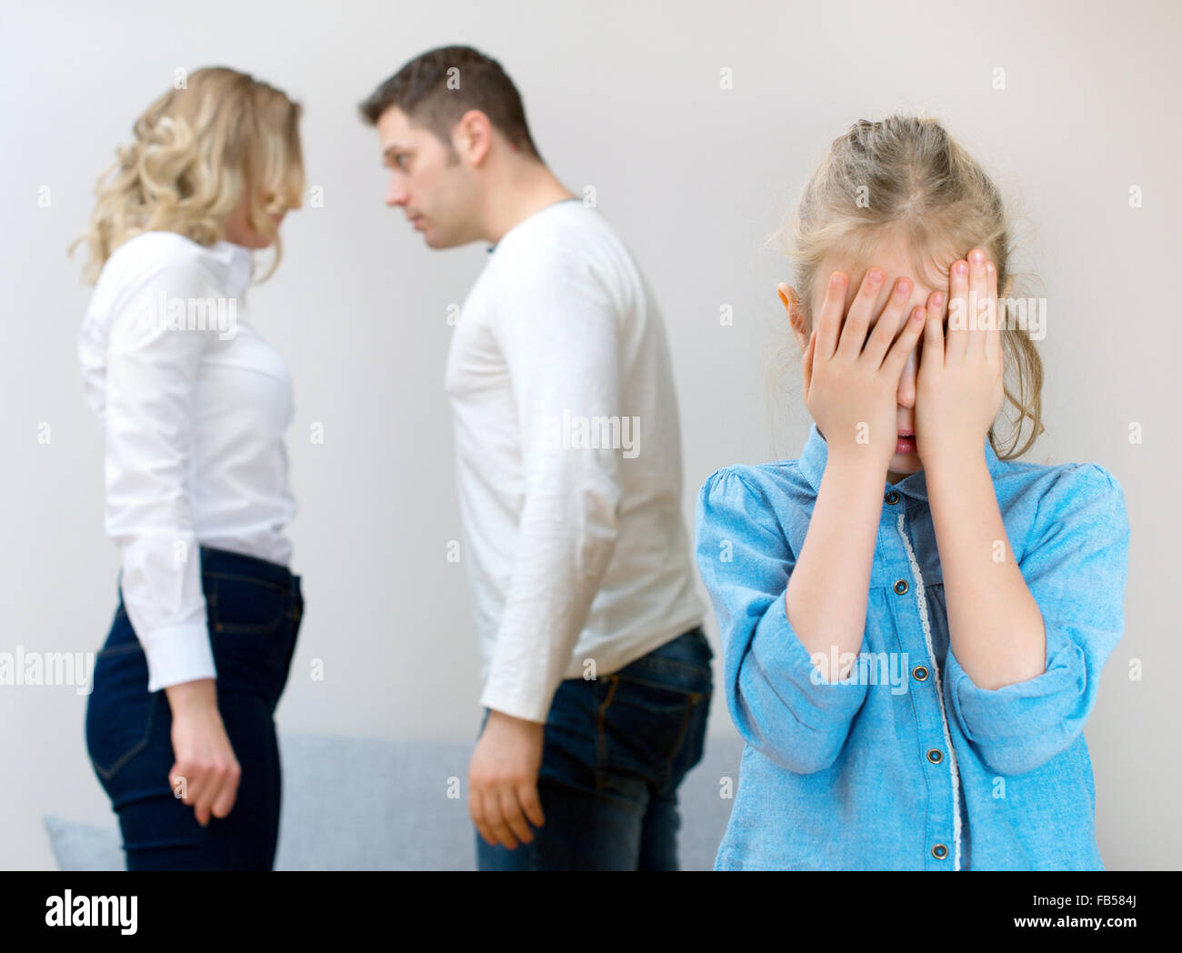 Parents quarreling at home, child in shock Stock Photo - Alamy