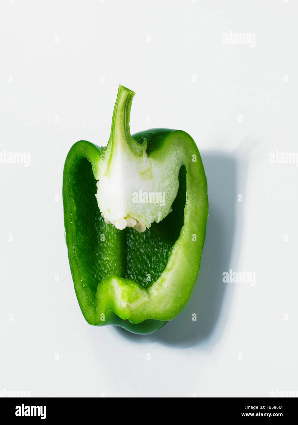 a slice of capsicum on the white background Stock Photo - Alamy