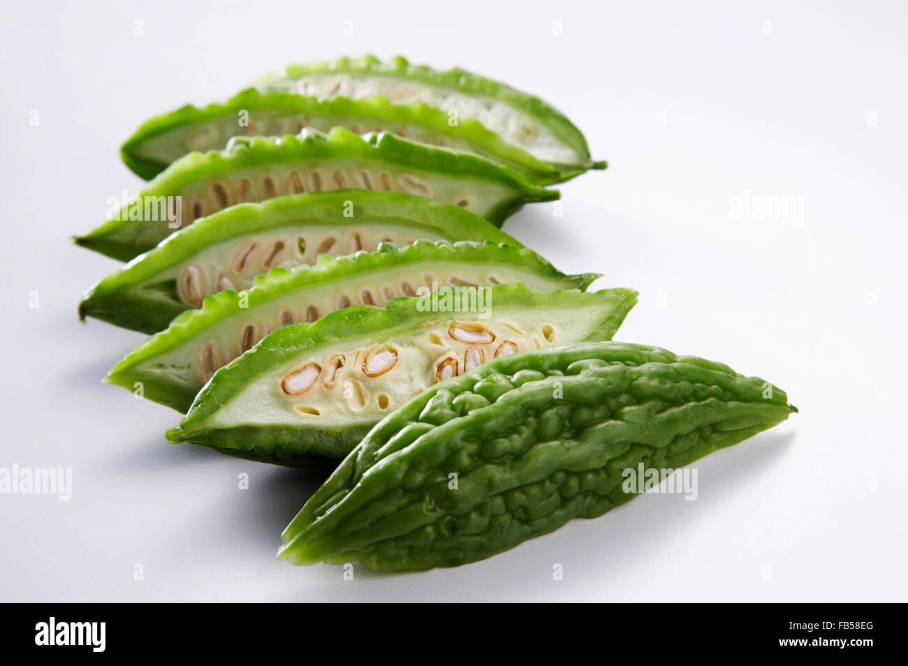 shot of bitter guard on the white background Stock Photo - Alamy