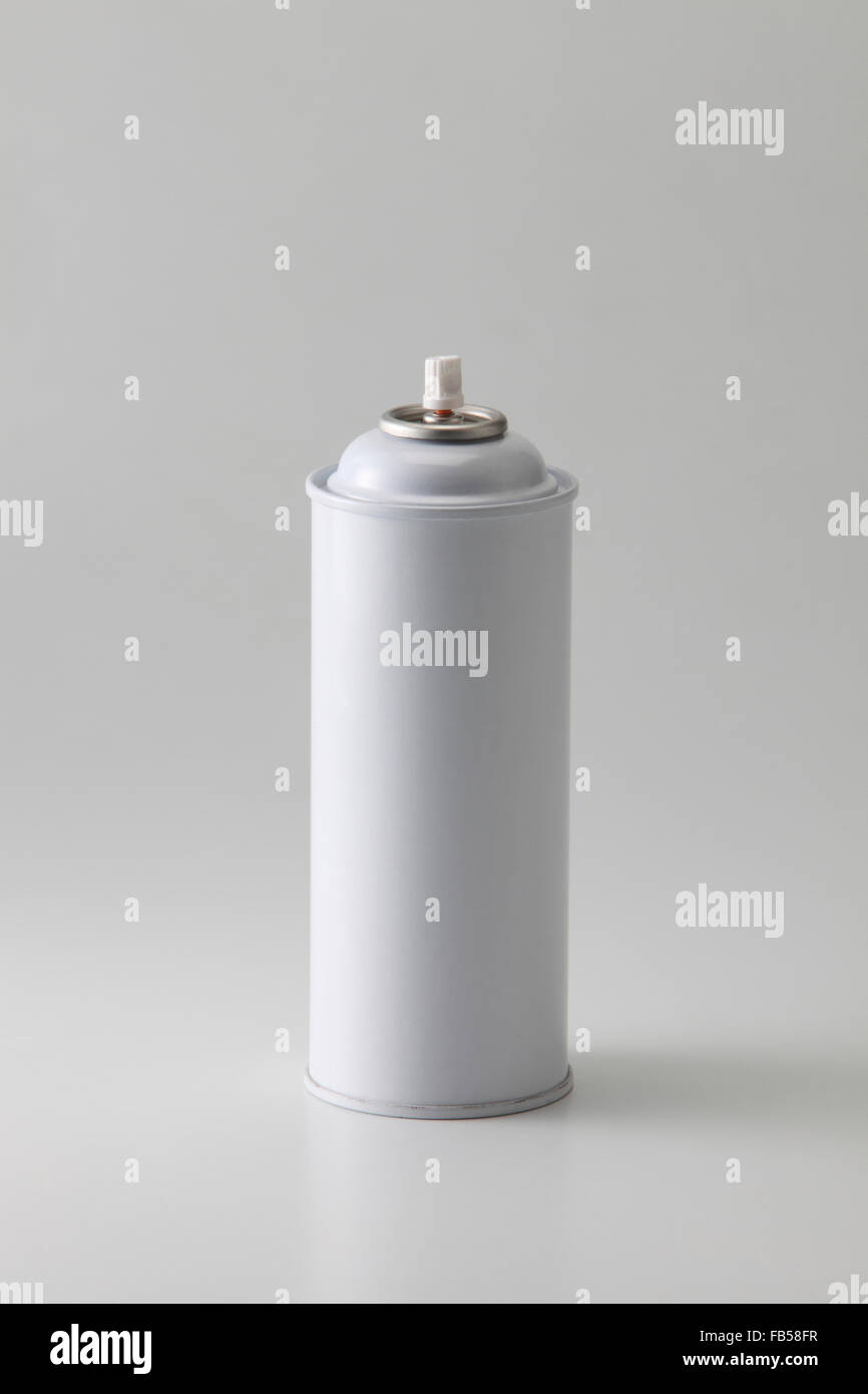 can spray on plain color background Stock Photo - Alamy