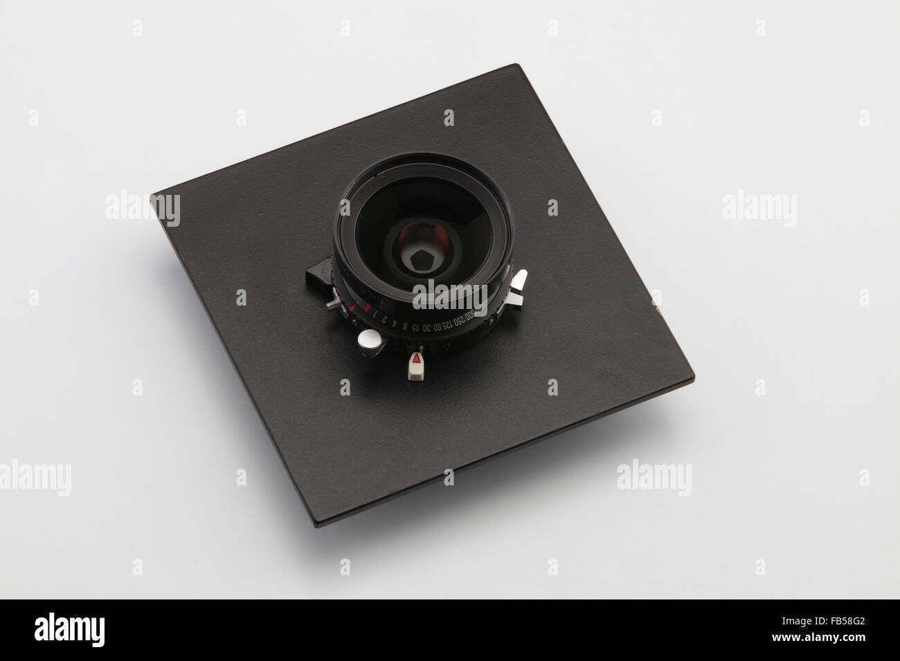 large format camera lenses on the plain color background Stock Photo ...