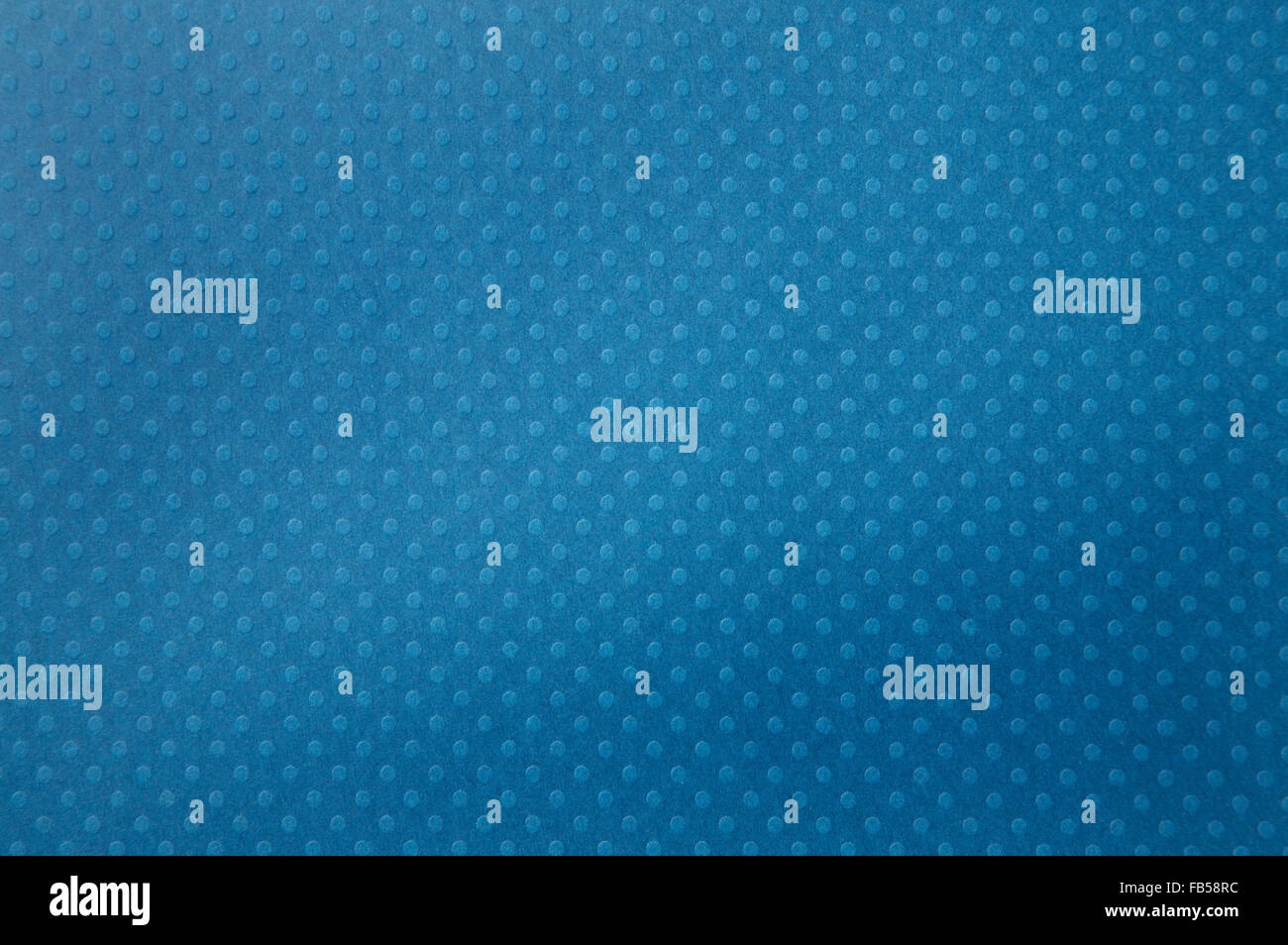 texture of blue color paper with dots Stock Photo - Alamy