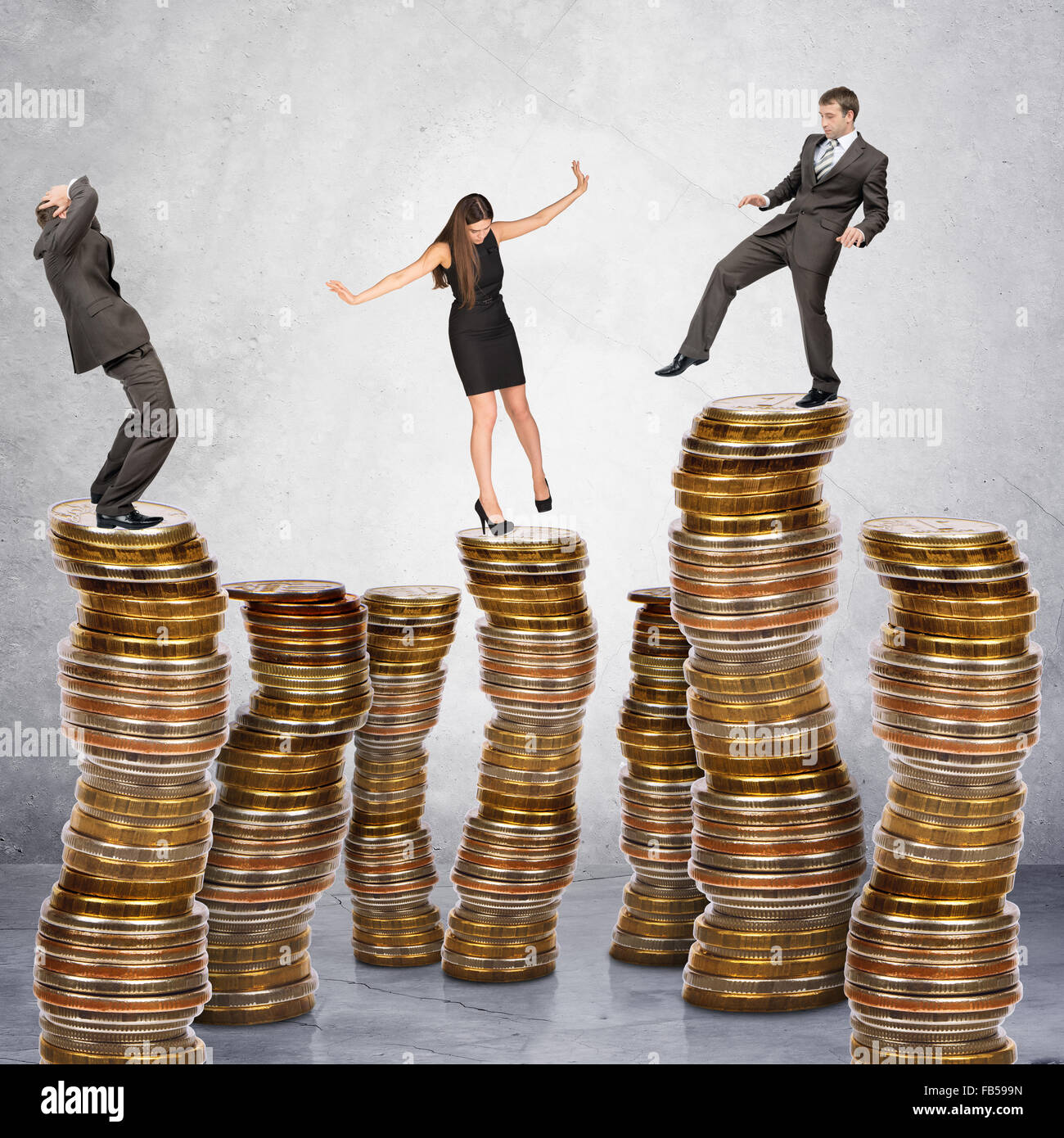 Business people standing on coins stack Stock Photo - Alamy