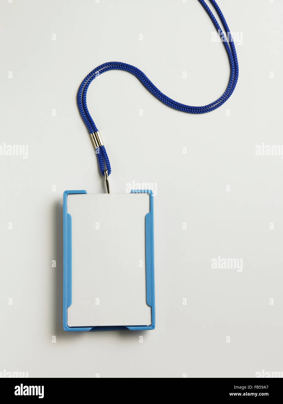name tag holder on the plain background Stock Photo - Alamy