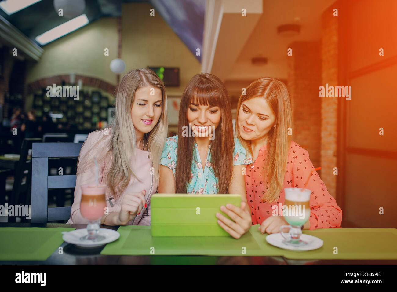 Girls with phones Stock Photo - Alamy