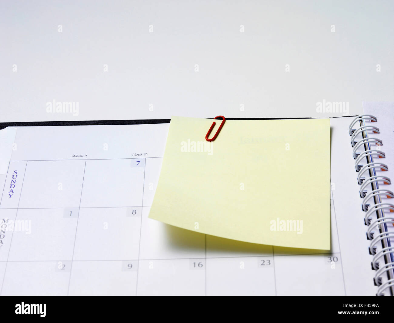 closes up of blank note clipped on organizer Stock Photo - Alamy