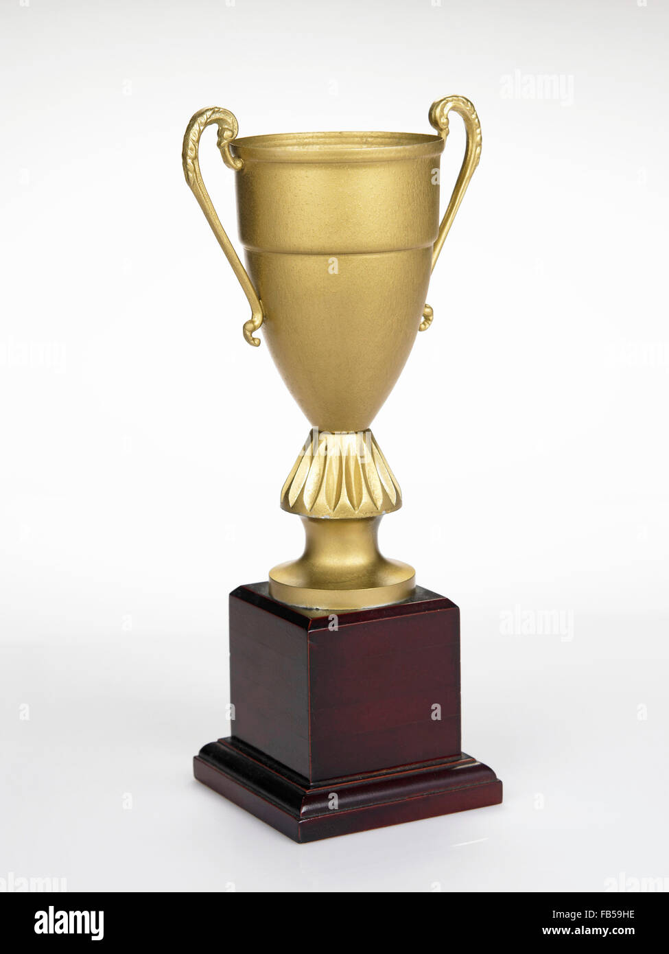 a gold trophy on the plain background Stock Photo - Alamy