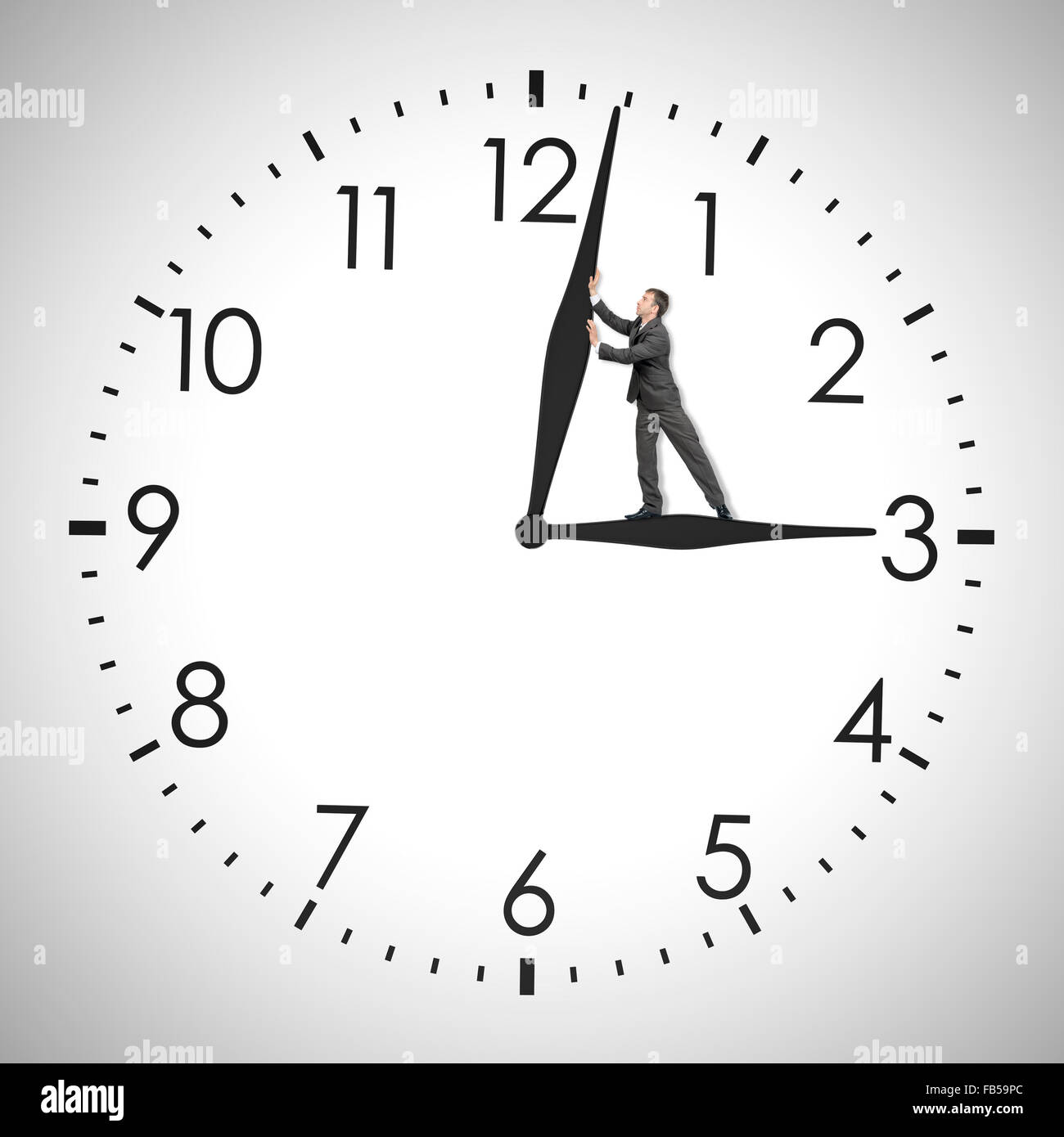 Businessman pushing clock hand Stock Photo - Alamy