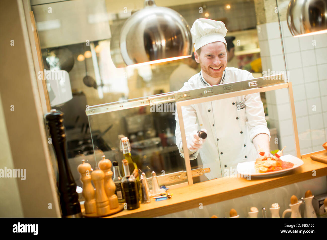 Chef in the restaurant Stock Photo - Alamy