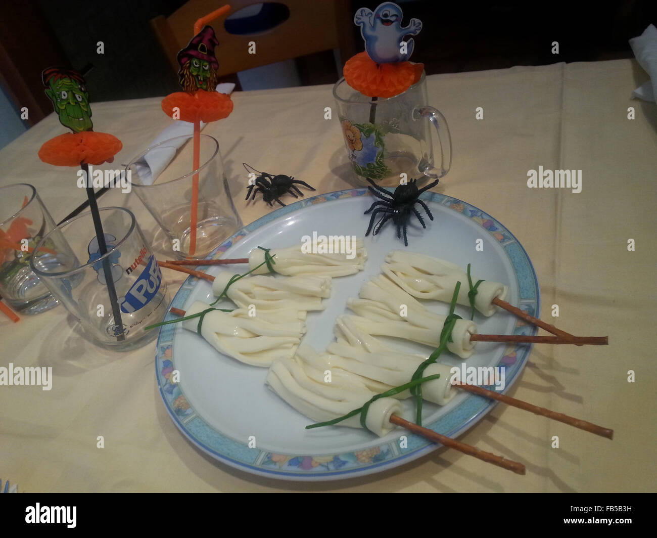 All ready for halloween dinner with cheese broom Stock Photo - Alamy