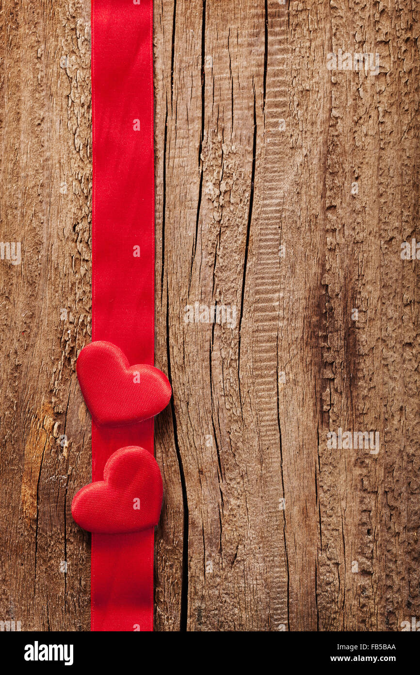 red hearts and ribbon frame wooden background for Valentines Stock ...
