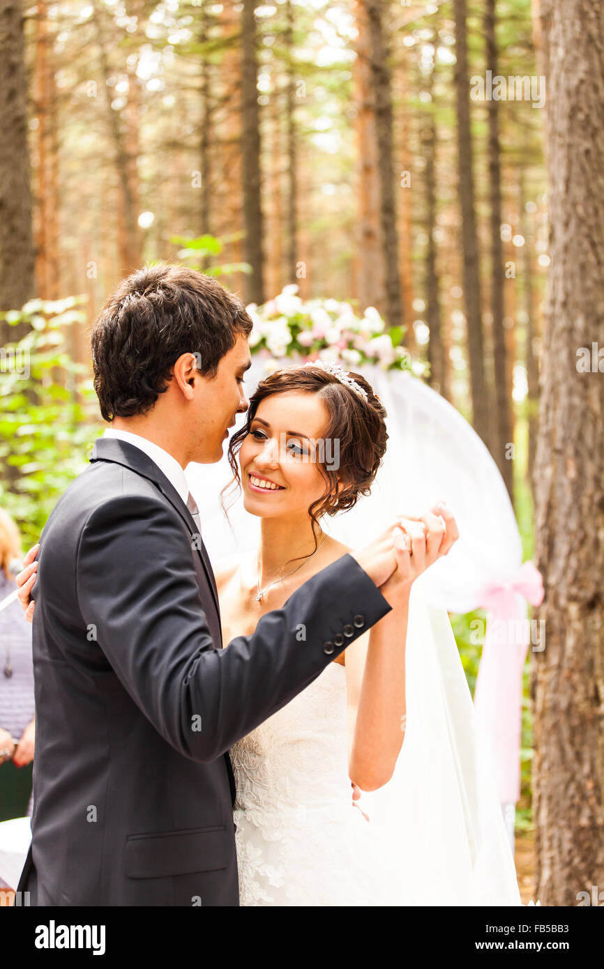 Bride with groom and wedding ceremony Stock Photo - Alamy