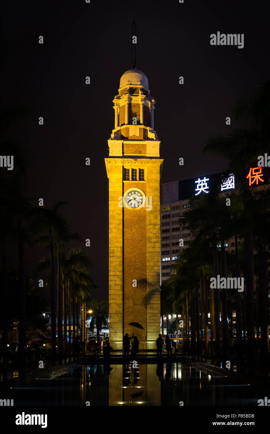 Hong Kong clock tower at night Stock Photo - Alamy