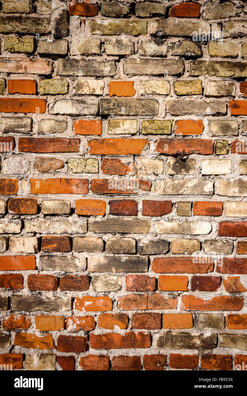 Background of yellow and red brick wall texture Stock Photo - Alamy