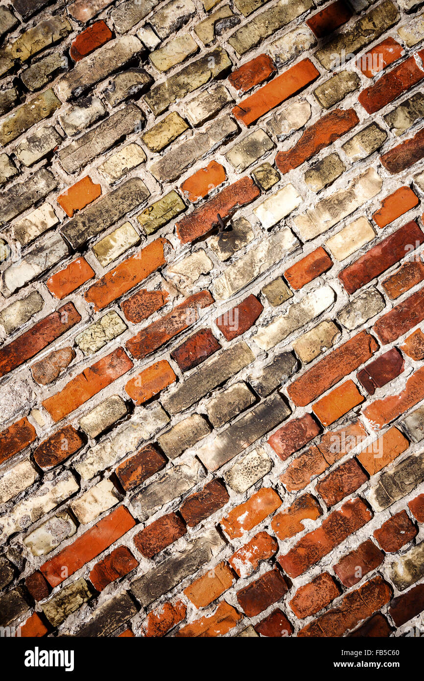 Background of yellow and red brick wall texture Stock Photo - Alamy