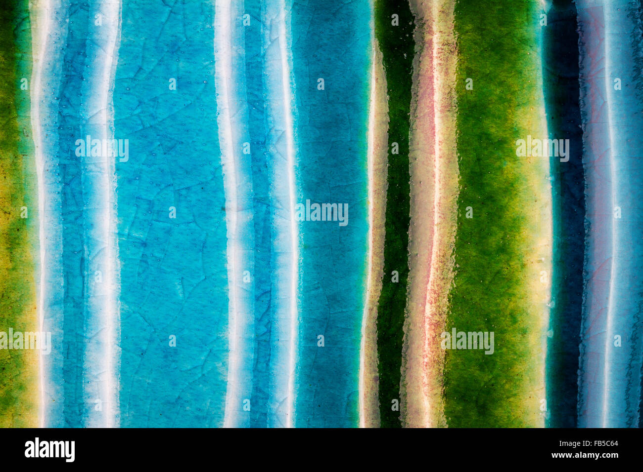 Closeup shot of glazed green and blue ceramics texture Stock Photo - Alamy