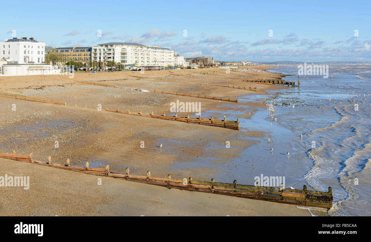 Looking along the nearly deserted empty beach in Winter at Worthing in ...